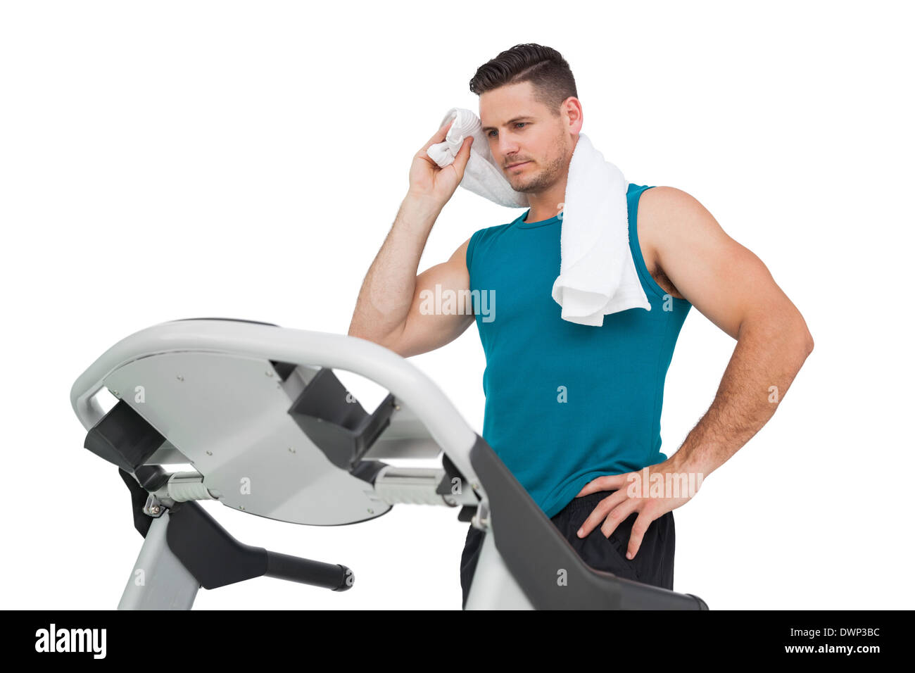 Young man running on a treadmill Stock Photo - Alamy