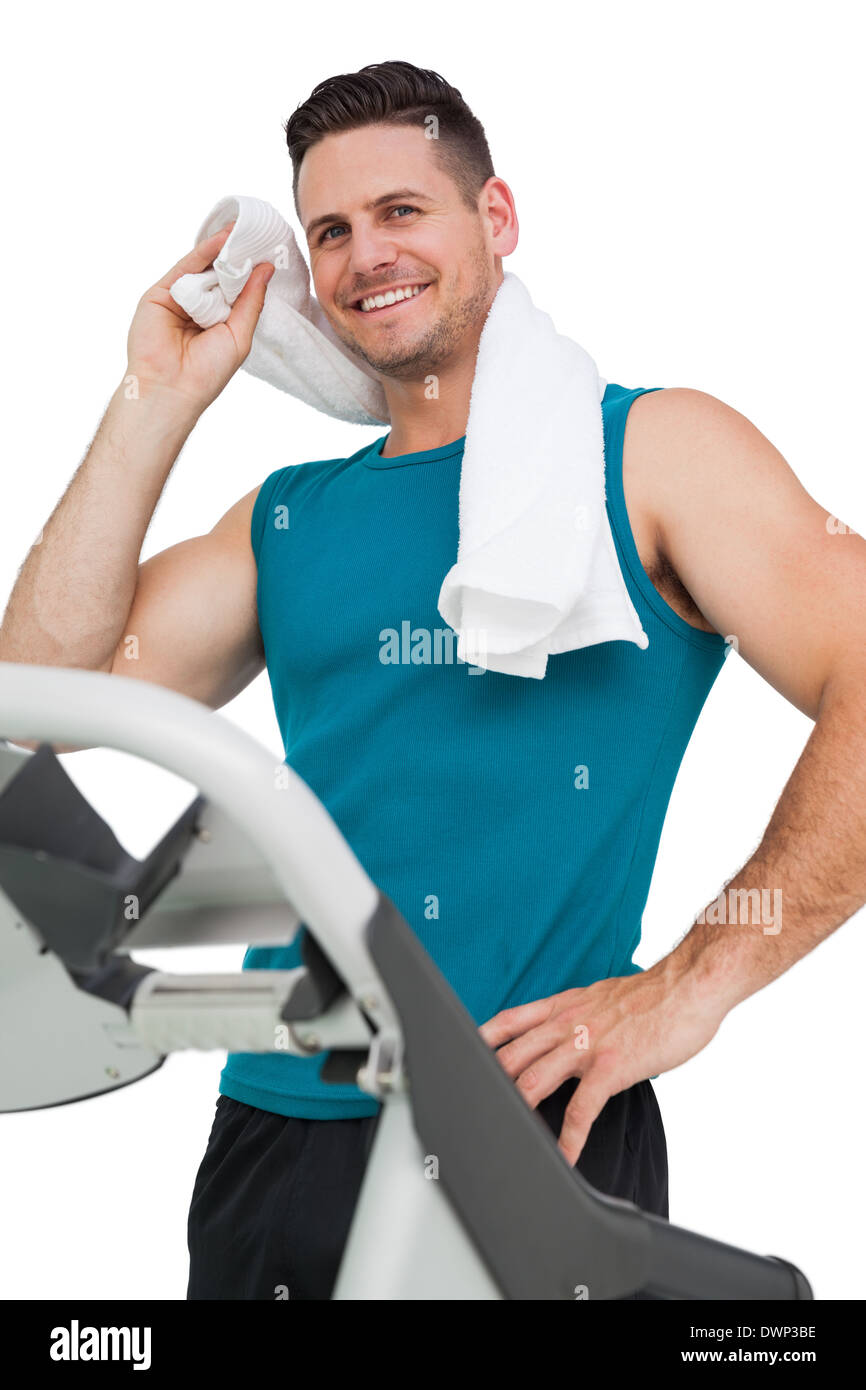 Young man running on a treadmill Stock Photo - Alamy