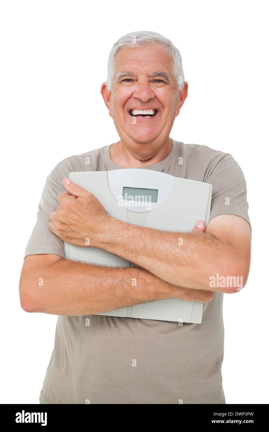 Man and scales hi-res stock photography and images - Alamy