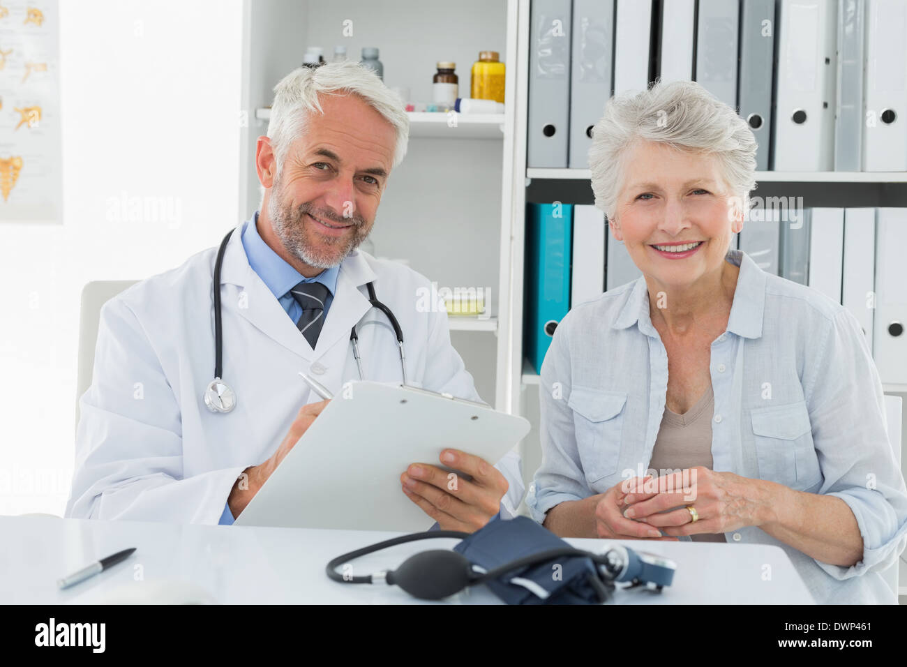 Doctor visiting happy senior hi-res stock photography and images - Alamy