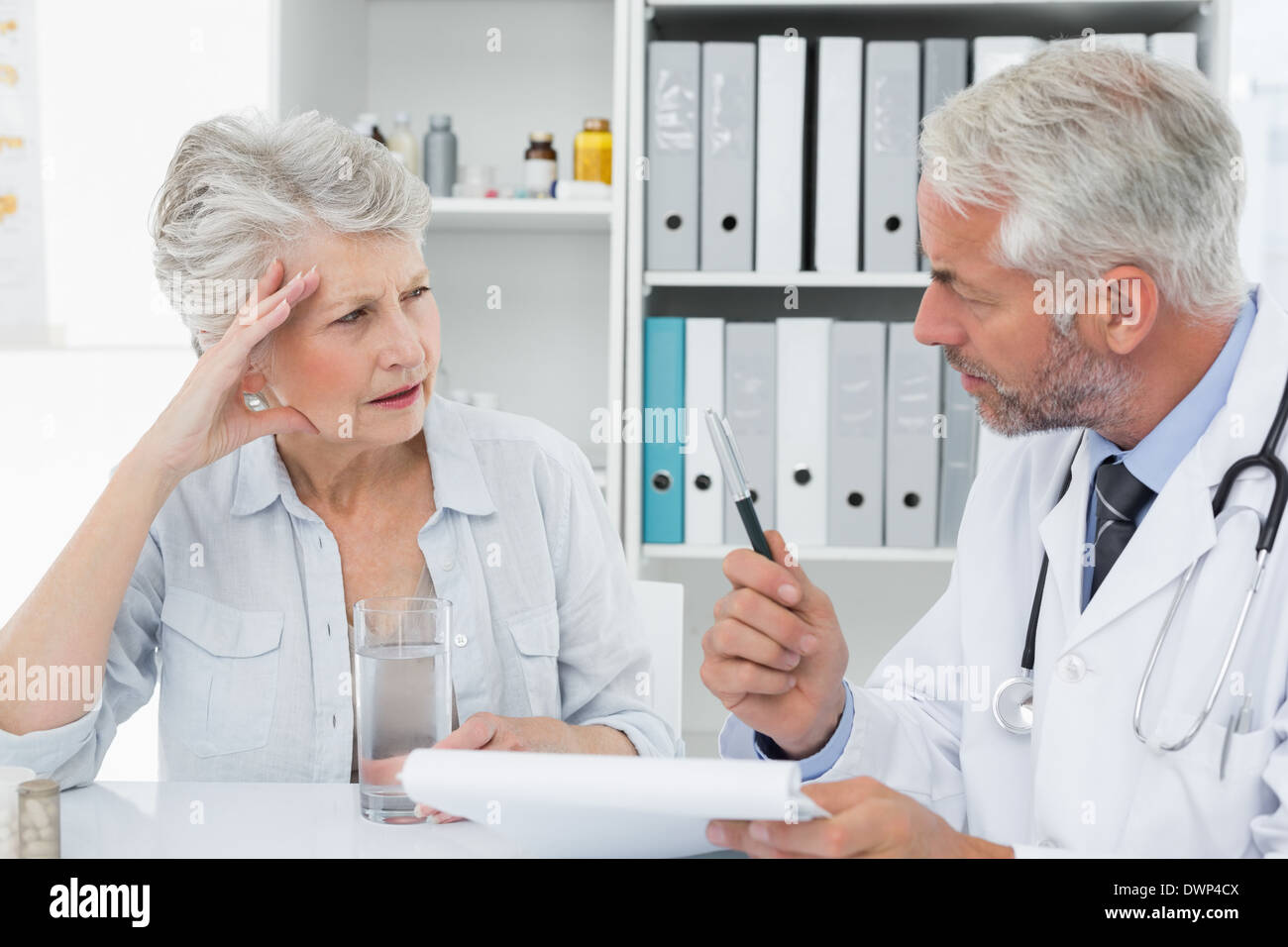 Female senior patient visiting a doctor Stock Photo - Alamy