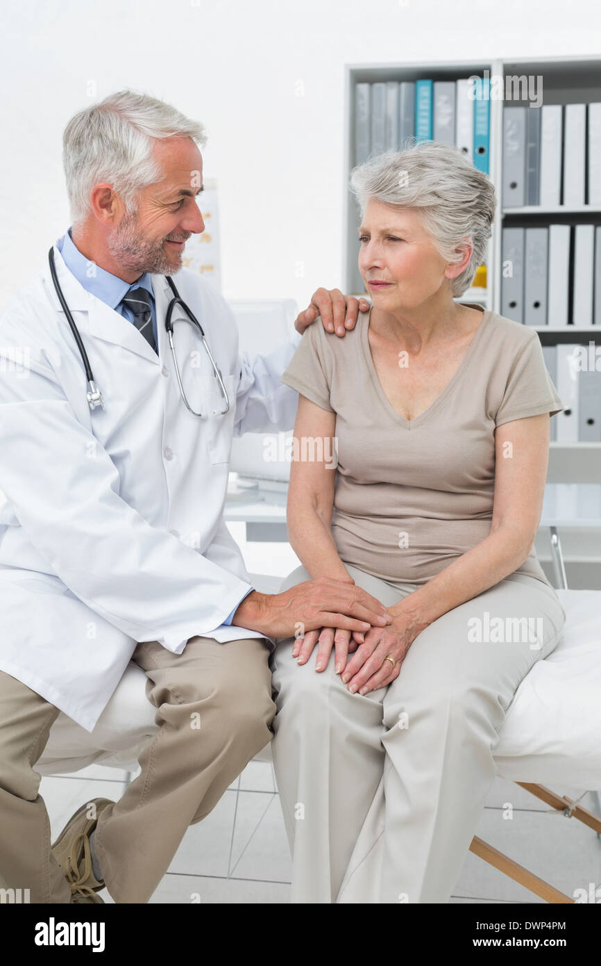 Female senior patient visiting a doctor Stock Photo - Alamy