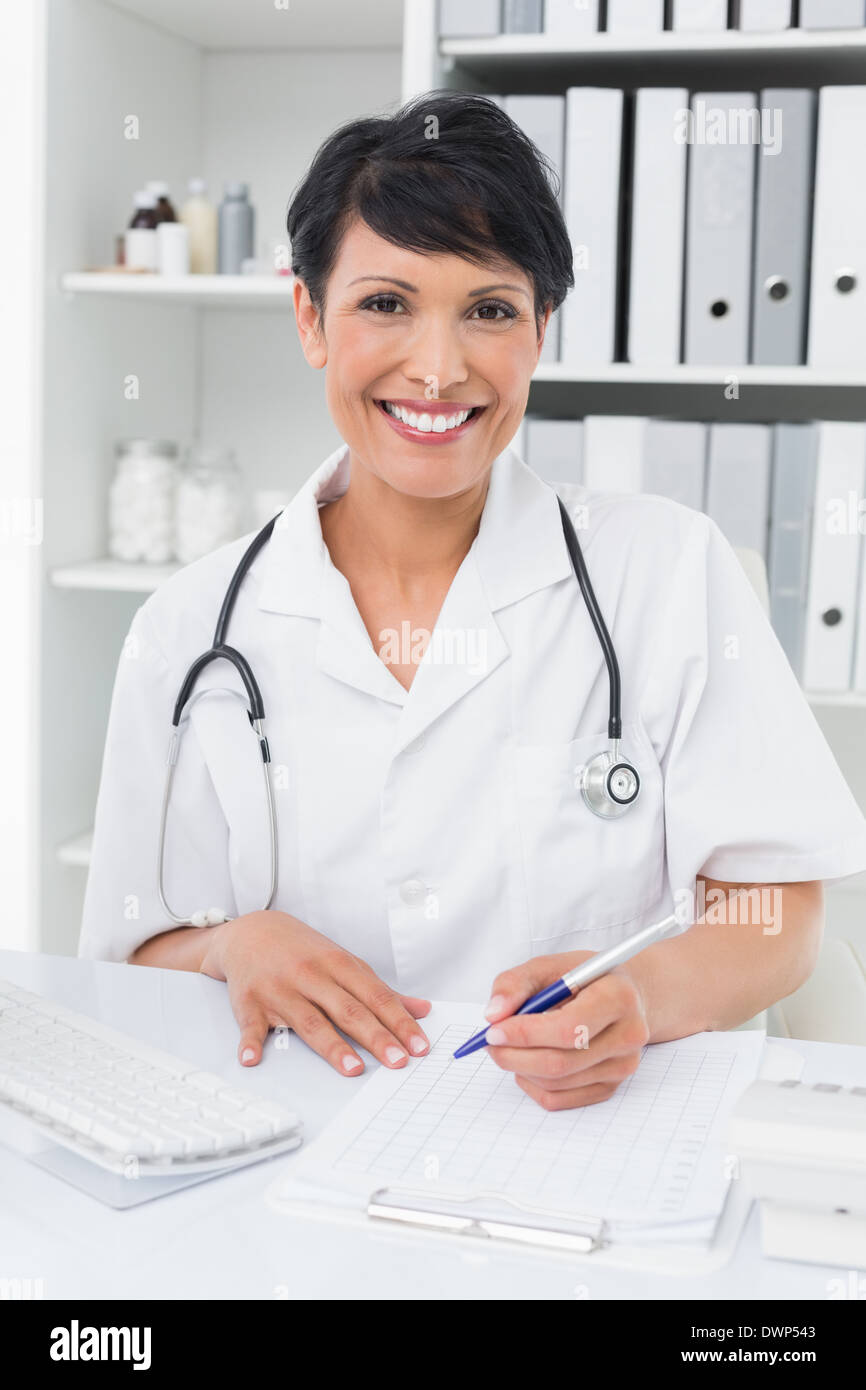 Portrait physician nurse standing desk hi-res stock photography and ...