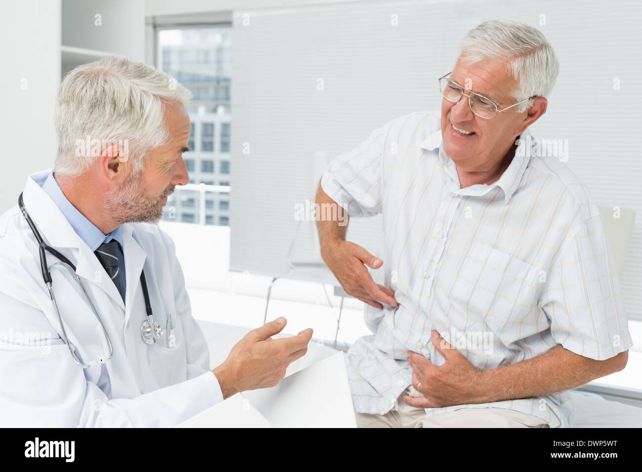 Visiting a doctor hi-res stock photography and images - Alamy
