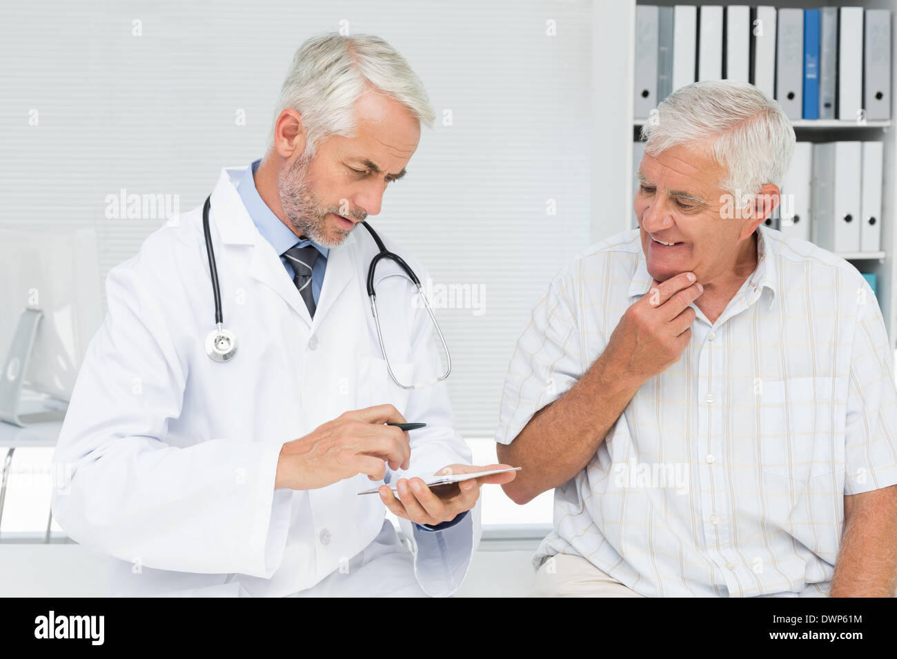 Doctor visit hi-res stock photography and images - Alamy