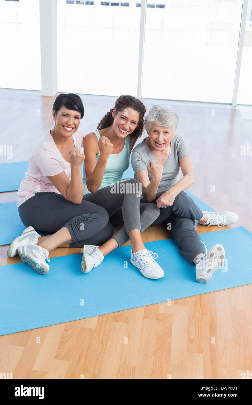 Full length portrait of happy women in yoga class Stock Photo - Alamy