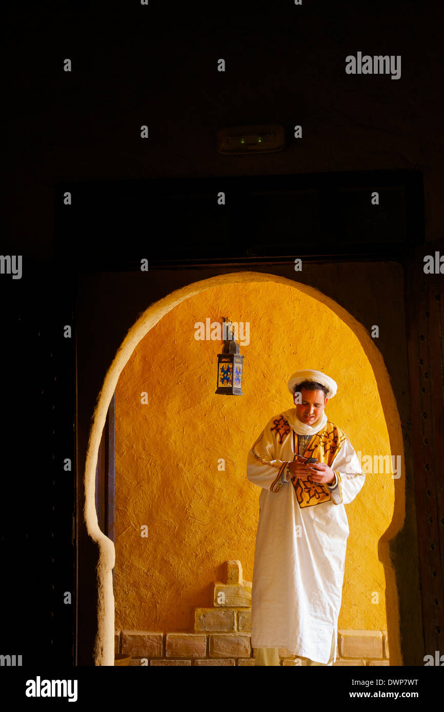 Berber Man In Berber Costume With Mobile Phone, Merzouga, Morocco ...