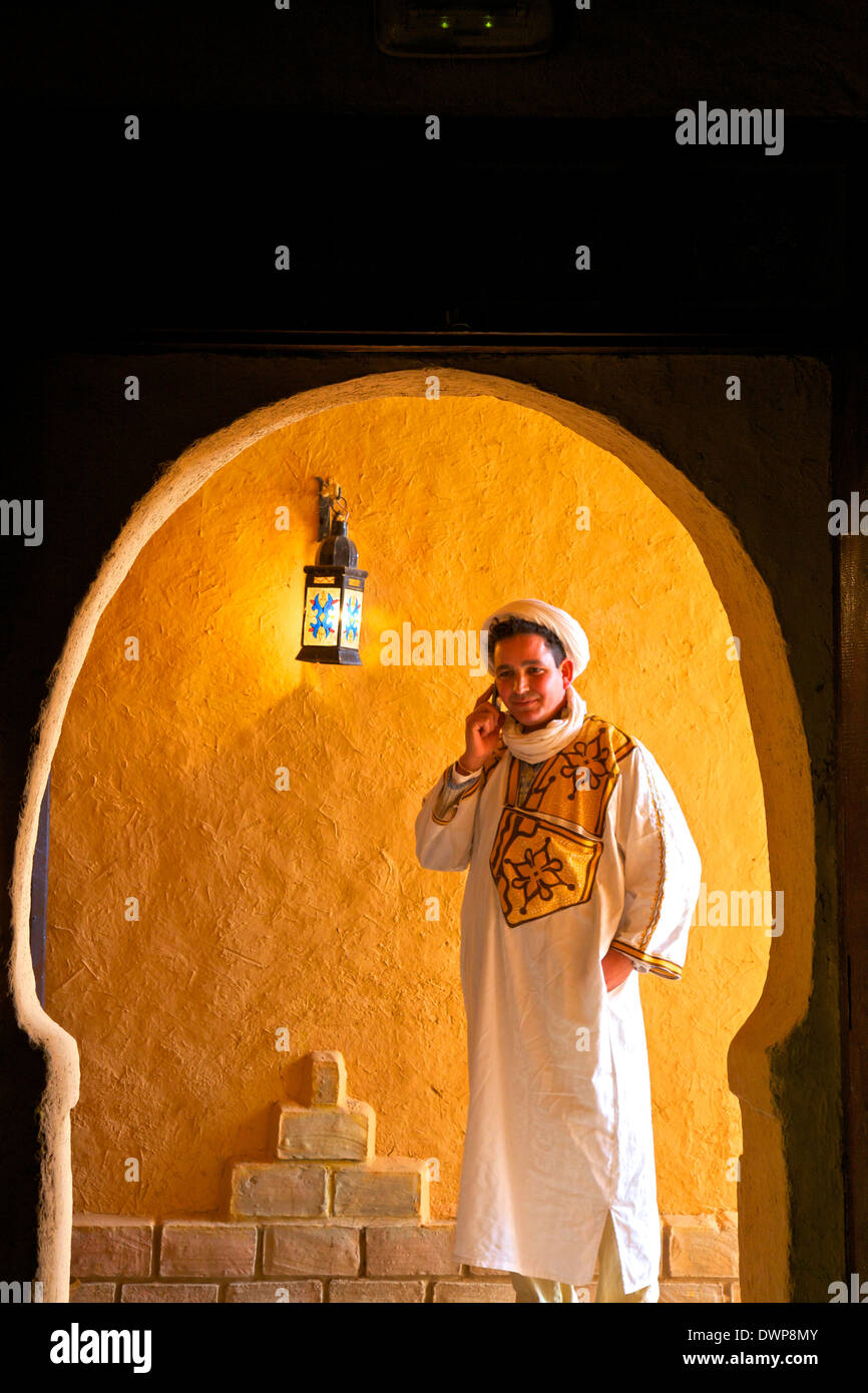 Berber Man In Berber Costume With Mobile Phone, Merzouga, Morocco ...