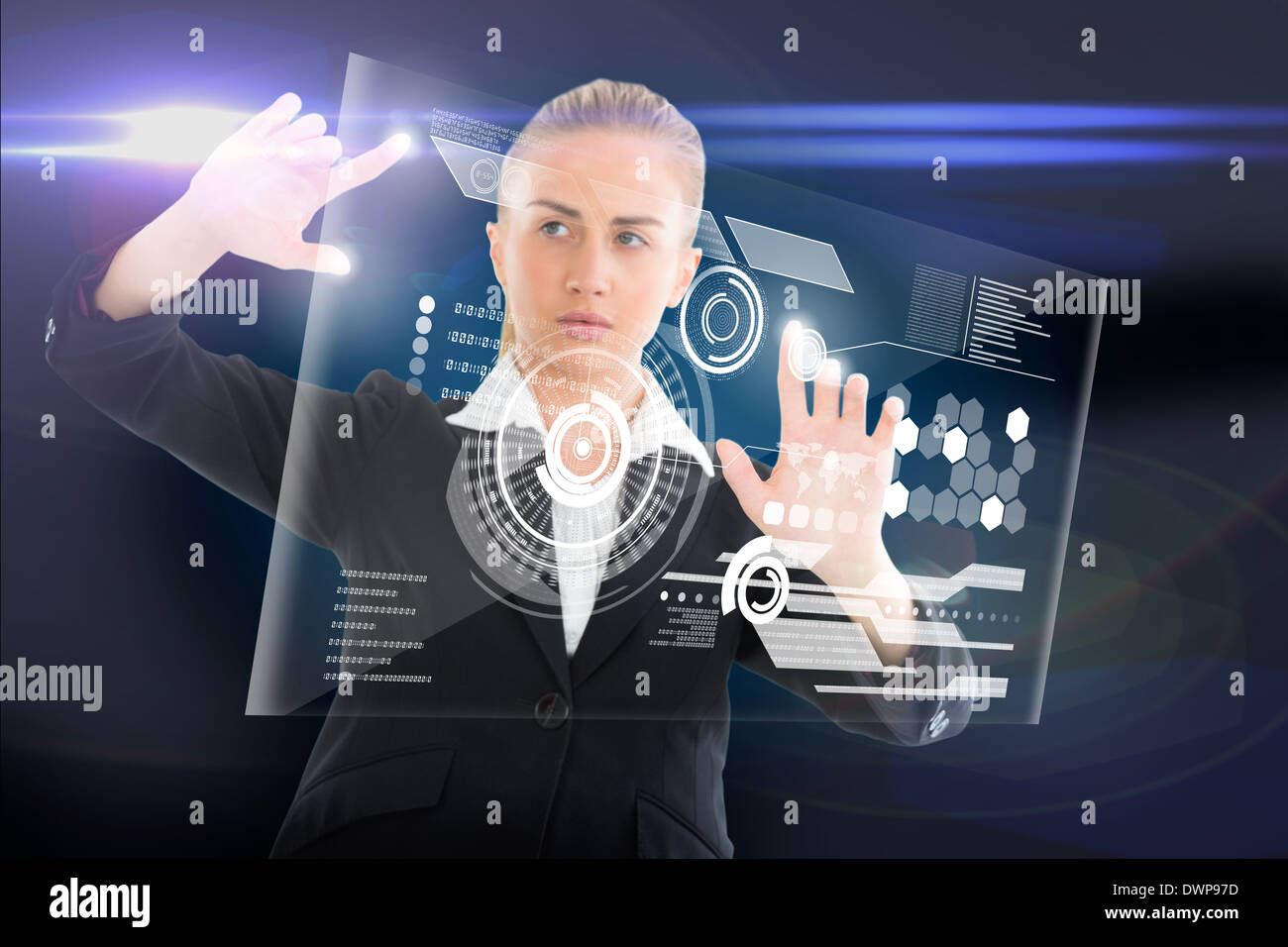 Blonde businesswoman touching interface Stock Photo - Alamy