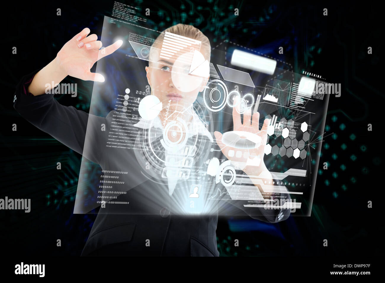 Blonde businesswoman touching interface Stock Photo - Alamy