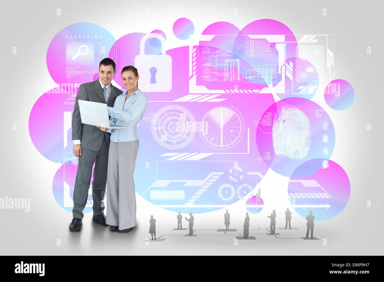 Happy business team using laptop with security interface Stock Photo ...