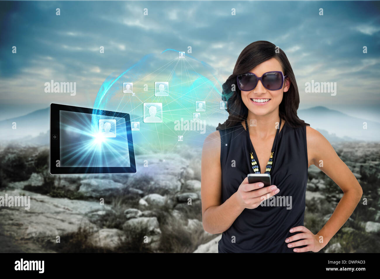 Glamorous brunette using smartphone with profile pictures Stock Photo ...