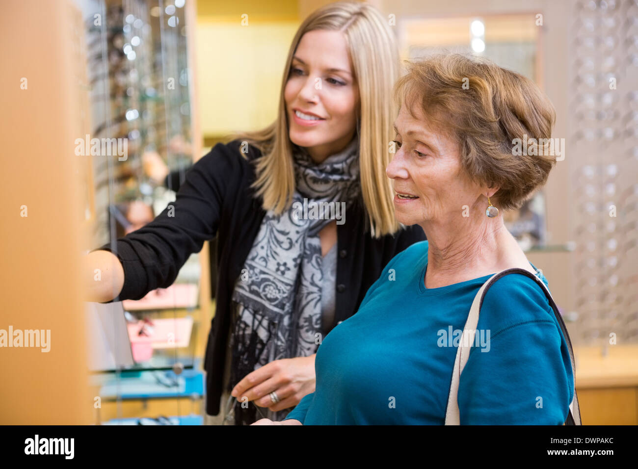 Business professional assisting client hi-res stock photography and ...