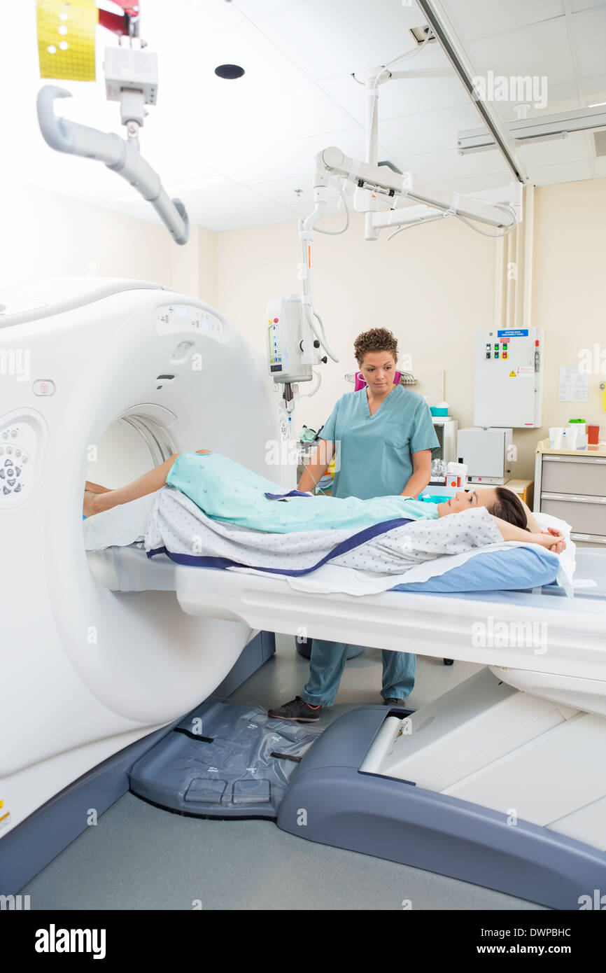 Nurse Preparing Patient For CT Scan Stock Photo - Alamy