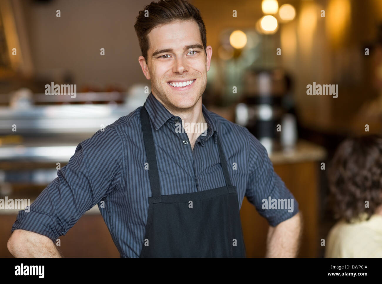 Happy Male Owner In Cafe Stock Photo - Alamy