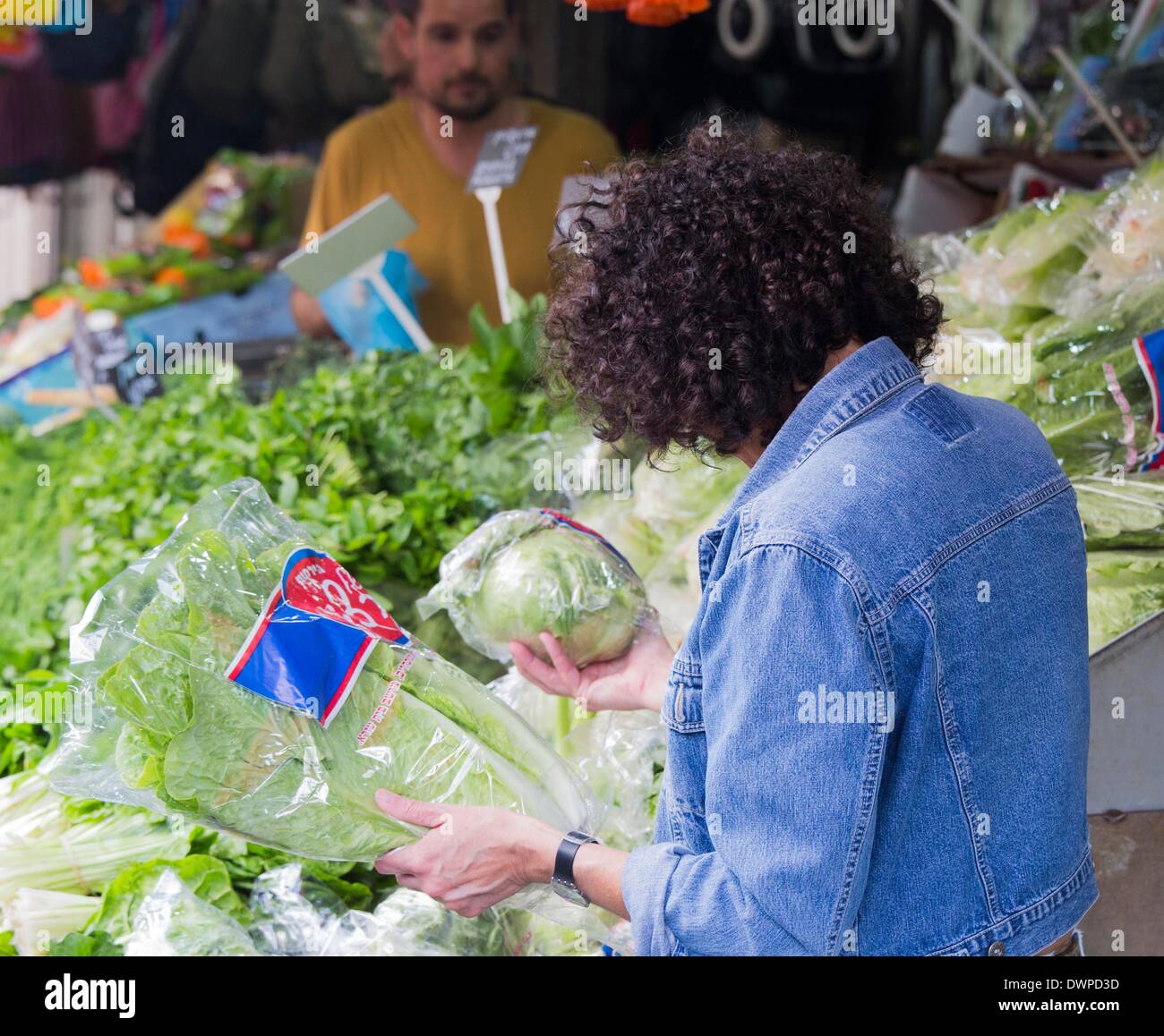 Carmel Market in Tel Aviv: woman buying vegetable Pictured 19.2.2014 ...