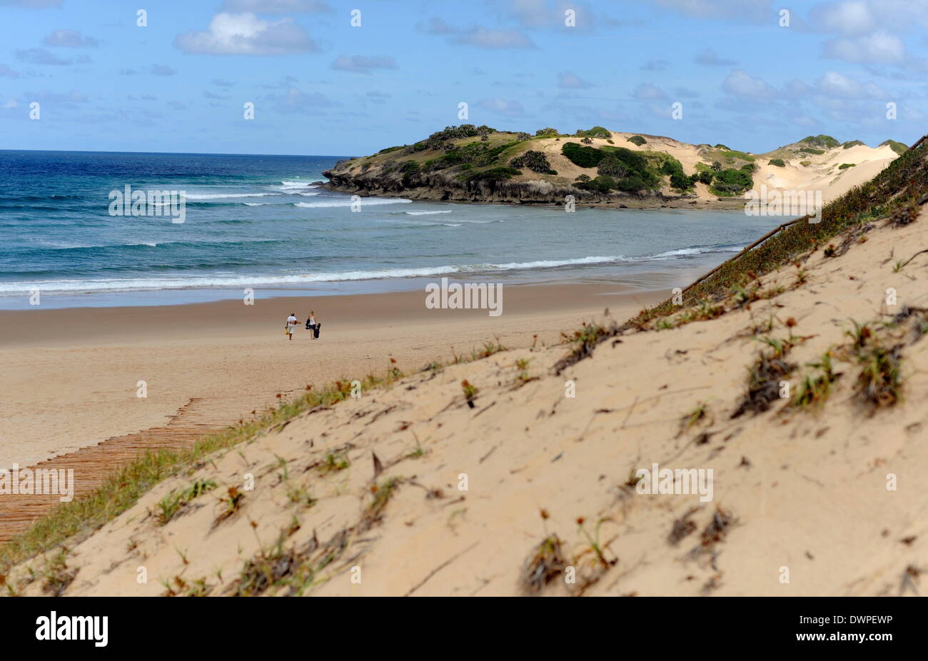 Tofo, Mozambique. 03rd Mar, 2013. Holiday-makers walk along the beach ...