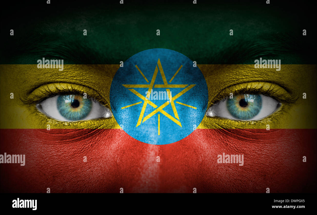 Human face painted with flag of Ethiopia Stock Photo - Alamy