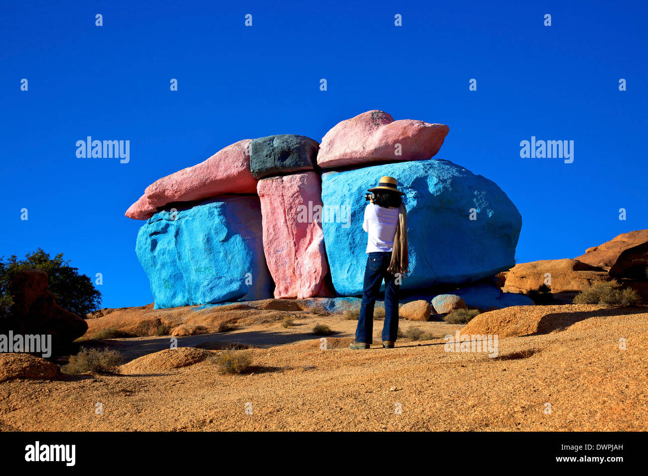 Tourist Taking Photographs Of Painted Rocks By Belgian Artist Jean ...