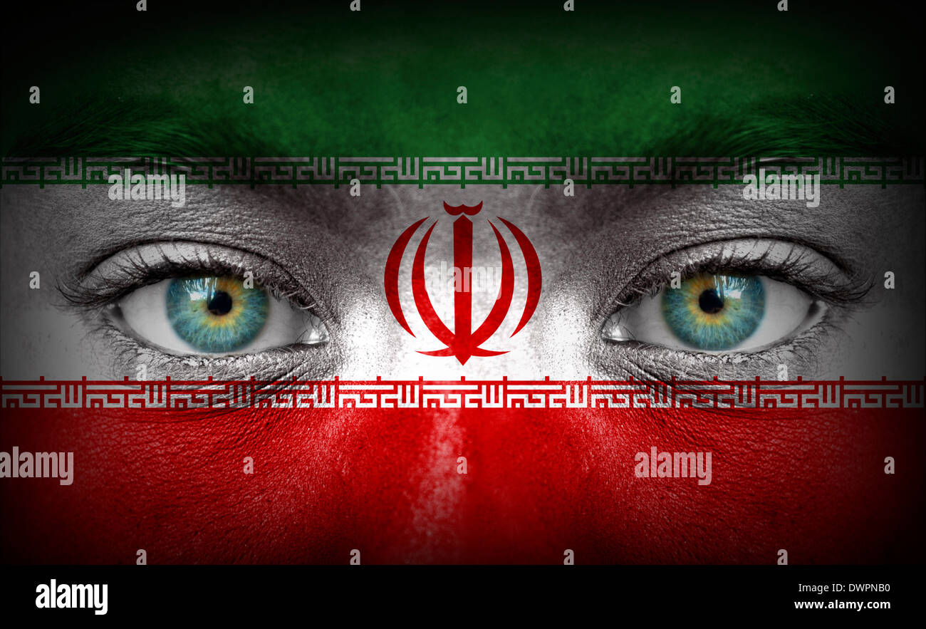 Human face painted with flag of Iran Stock Photo - Alamy