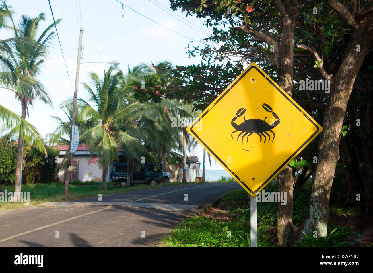 crab crossing caution street sign on only road Big Corn Island ...