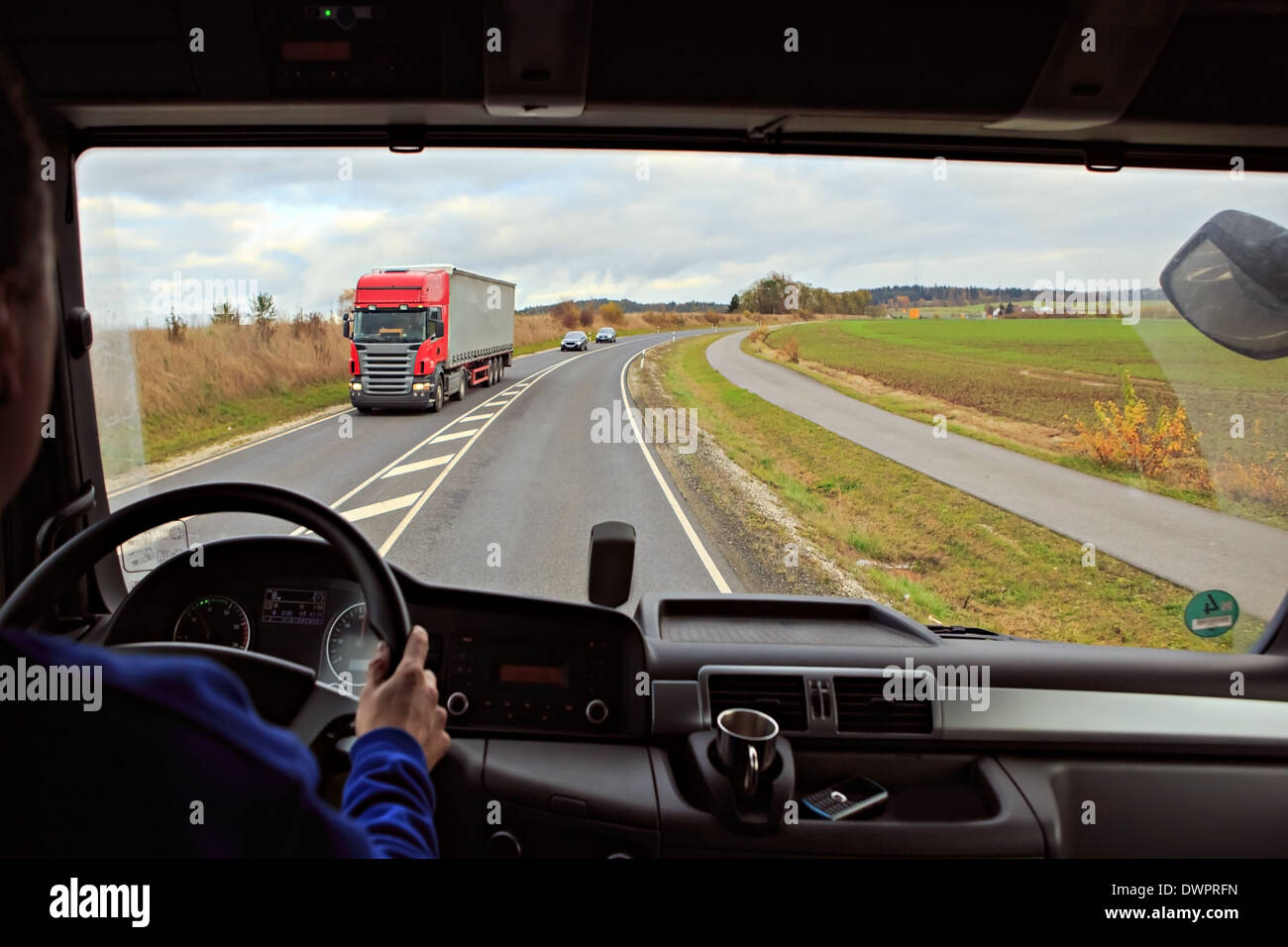 driver view from the cockpit of a truck on the road Stock Photo - Alamy