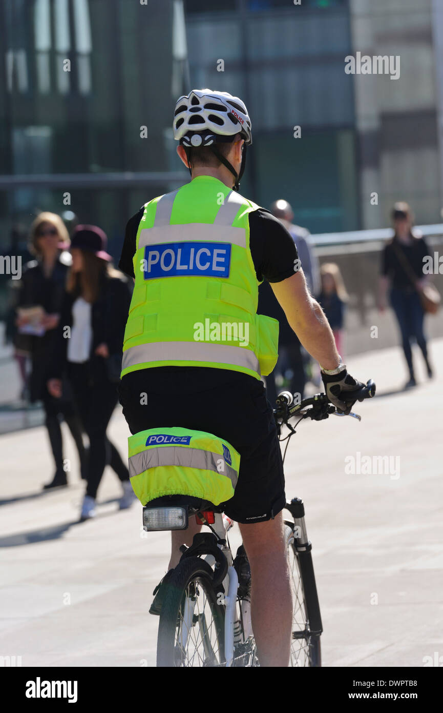 Police officer riding bike hi-res stock photography and images - Alamy