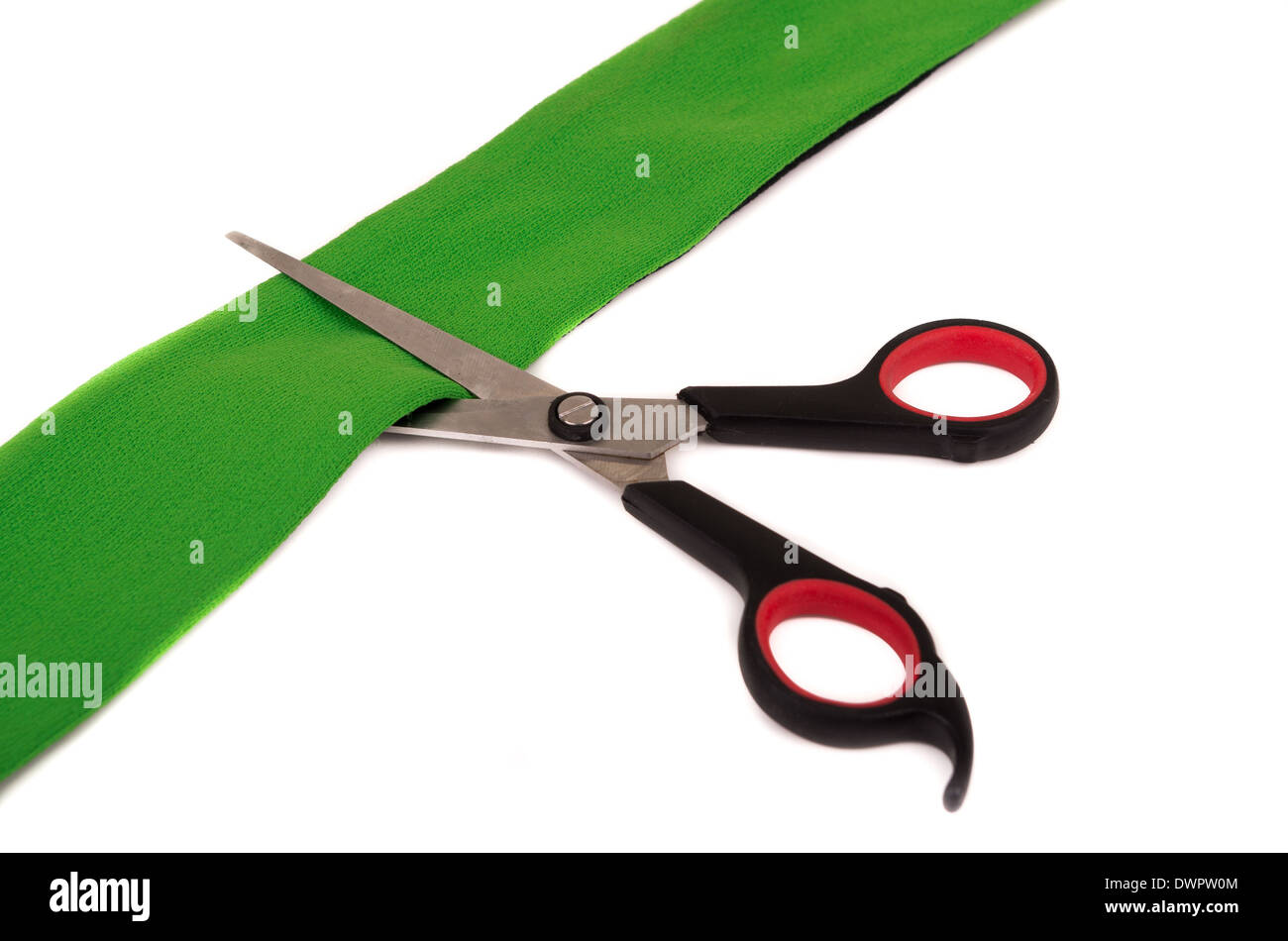 cutting the ribbon green isolated on white Stock Photo - Alamy