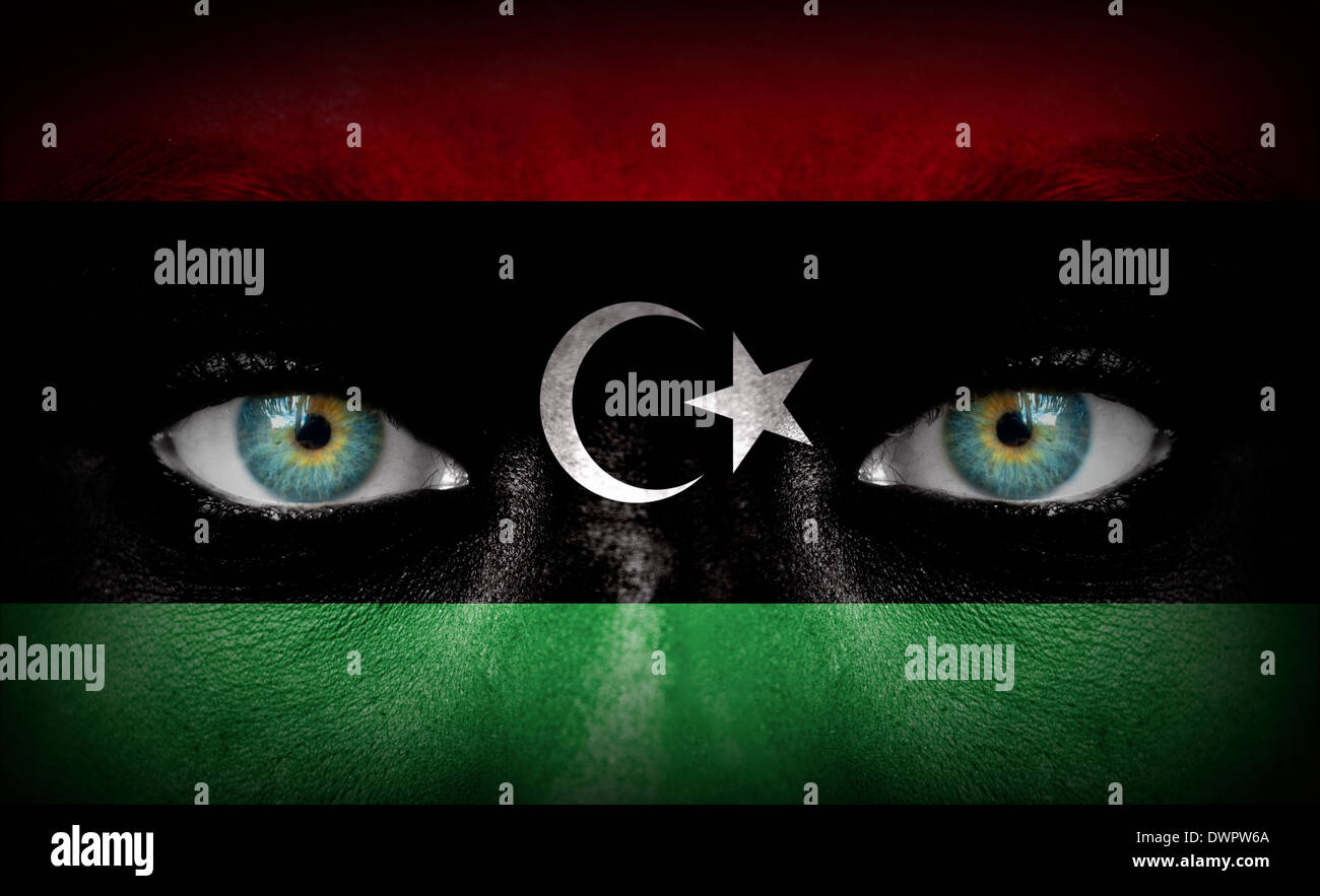 Human face painted with flag of Libya Stock Photo - Alamy