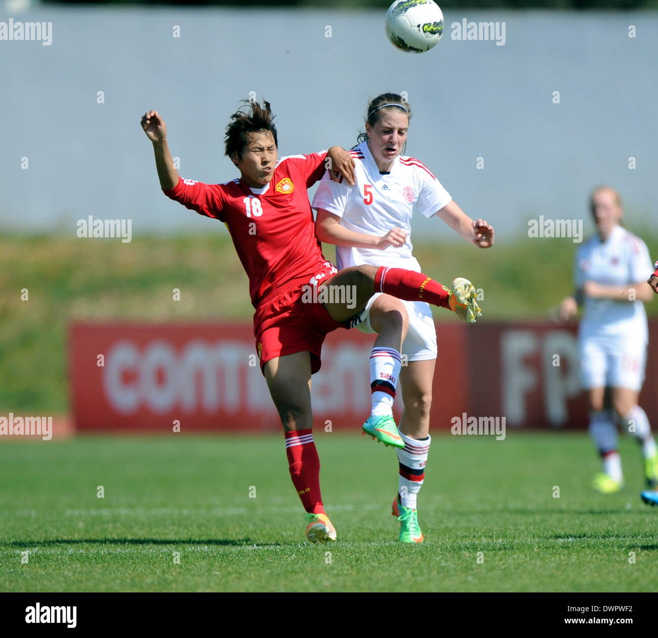 Albufeira. 12th Mar, 2014. China's Han Peng (L) competes during the ...
