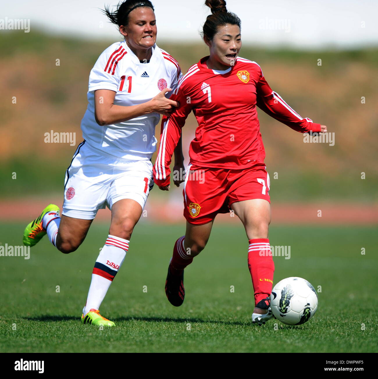 Albufeira. 12th Mar, 2014. China's Xu Yanlu (R) competes during the ...