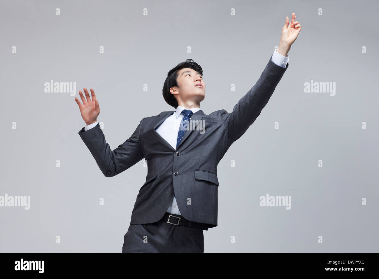 Businessman trying reach something hi-res stock photography and images ...