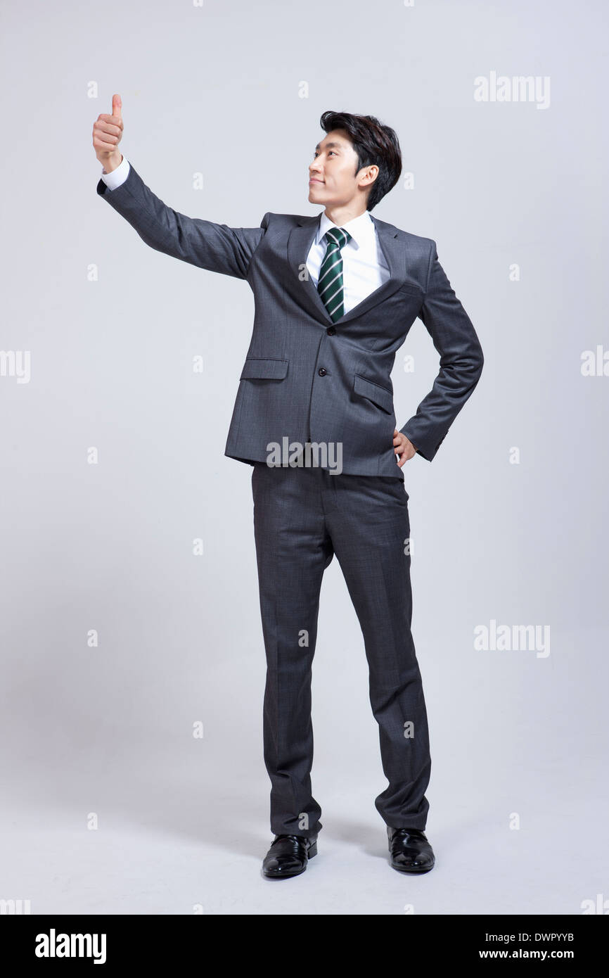 a businessman waving his hand Stock Photo - Alamy