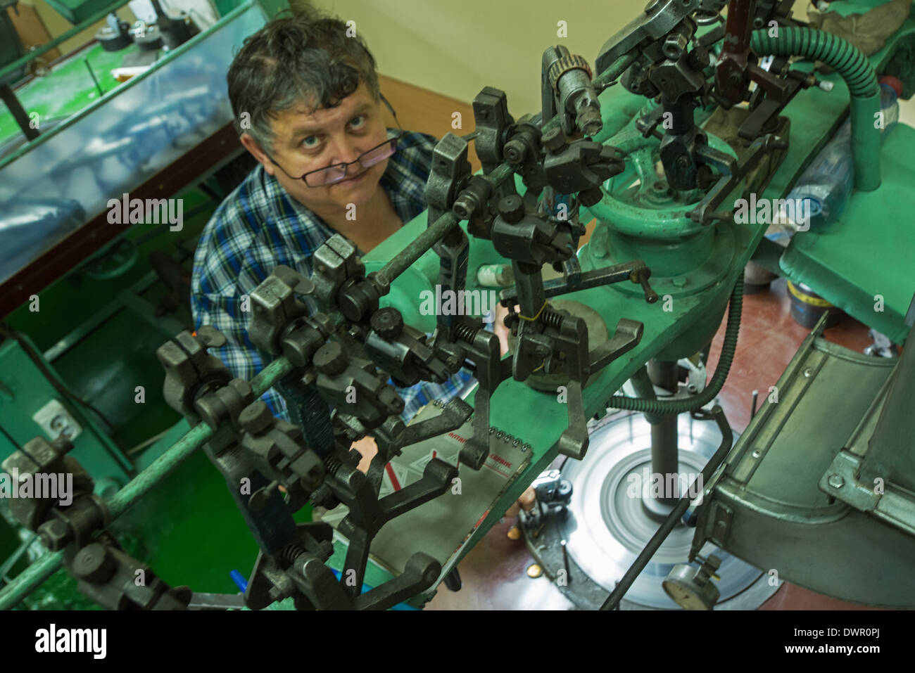 Diamond polisher is looking at photographer. Yakutian Dimond cutting ...
