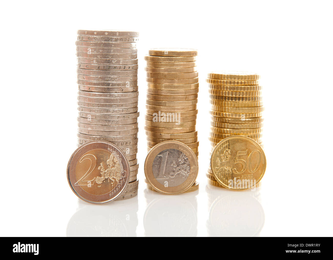 Piles of Euro money coins over white background Stock Photo - Alamy