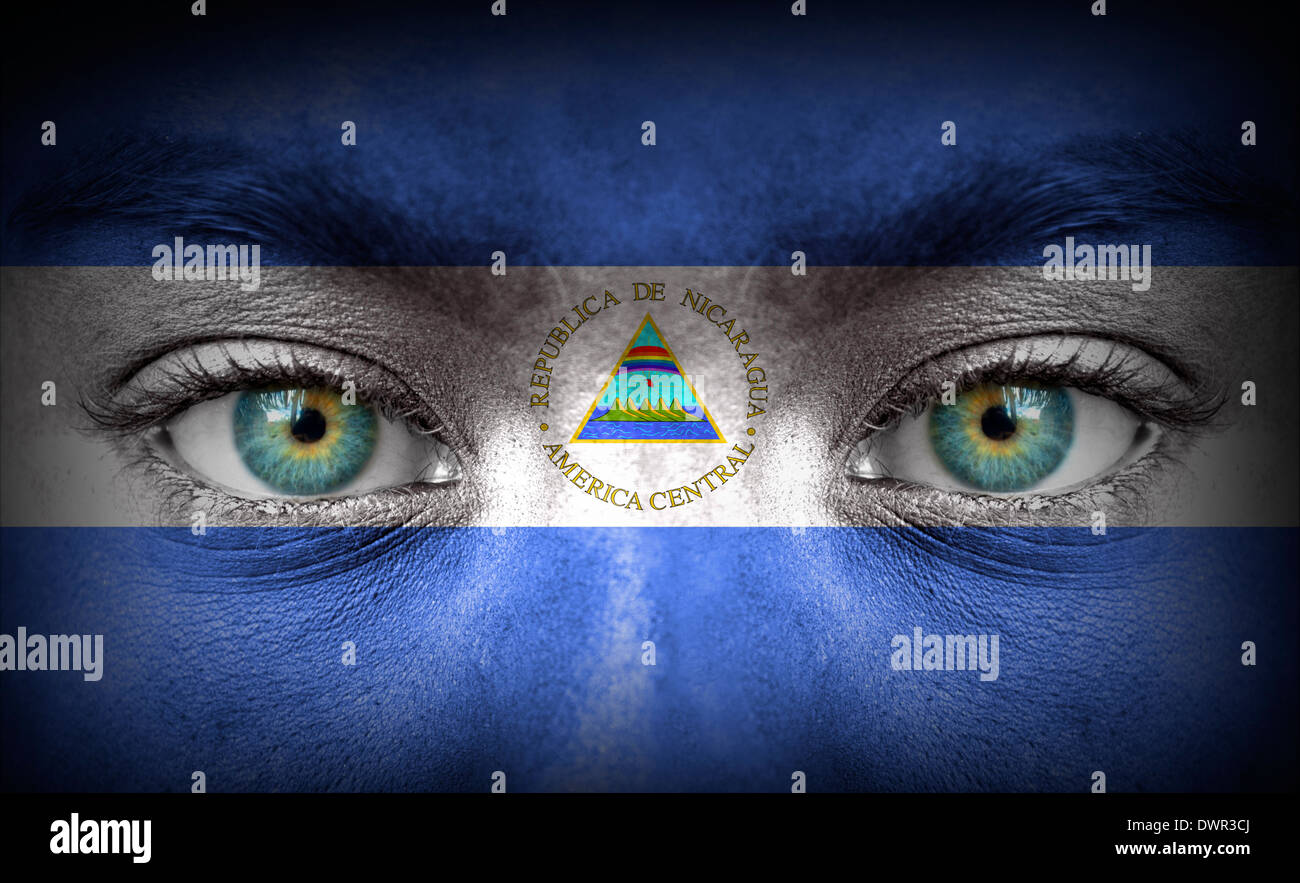 Human face painted with flag of Nicaragua Stock Photo - Alamy