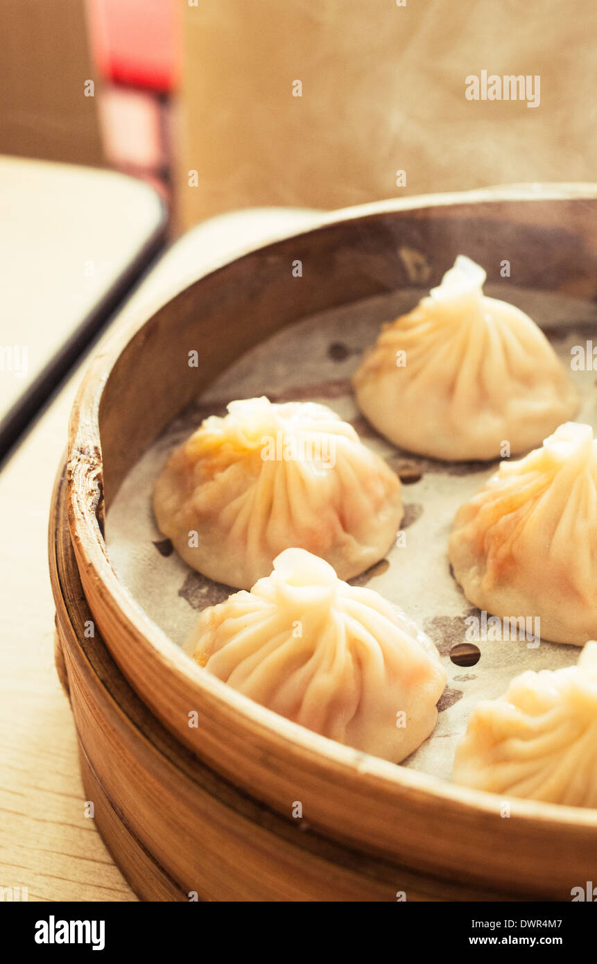 chinese dumplings or xiao long bao in bamboo tray, famous food in ...