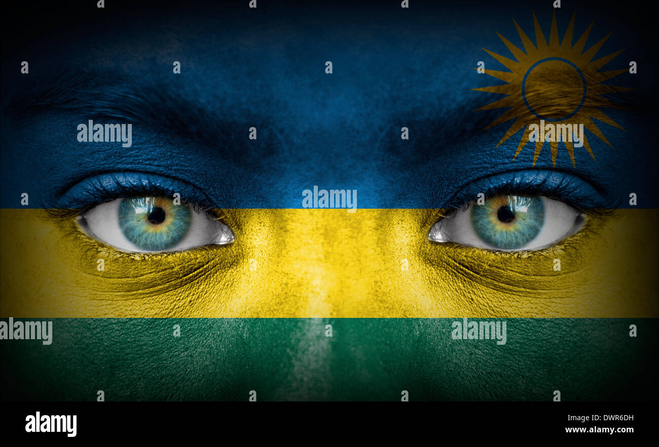 Human face painted with flag of Rwanda Stock Photo - Alamy