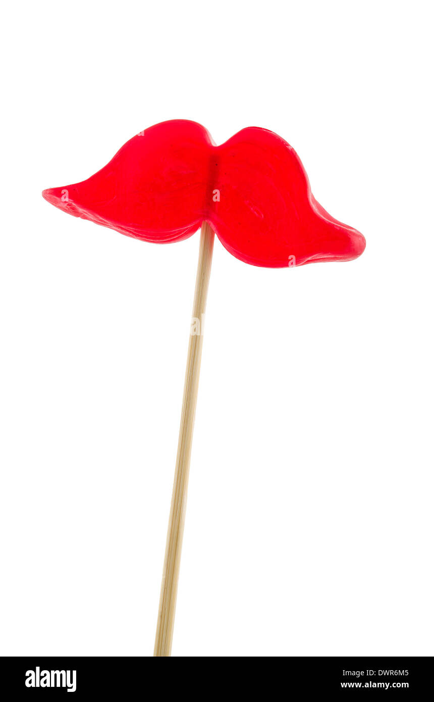 lollipop in the shape of red lips, shot on white Stock Photo - Alamy