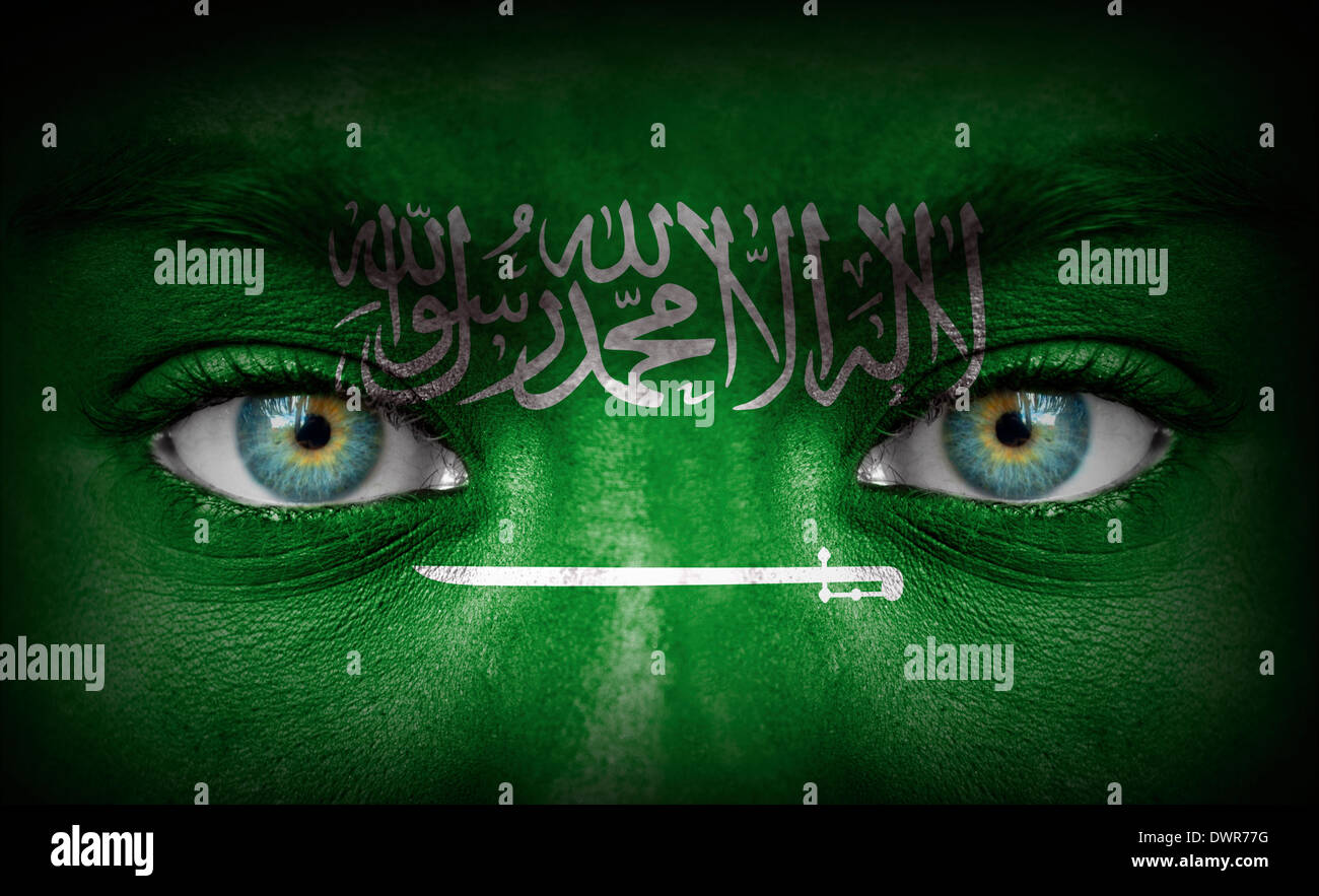 Human face painted with flag of Saudi Arabia Stock Photo - Alamy