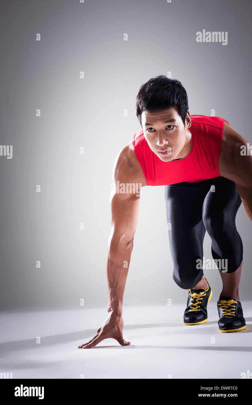 a runner in starting position Stock Photo - Alamy