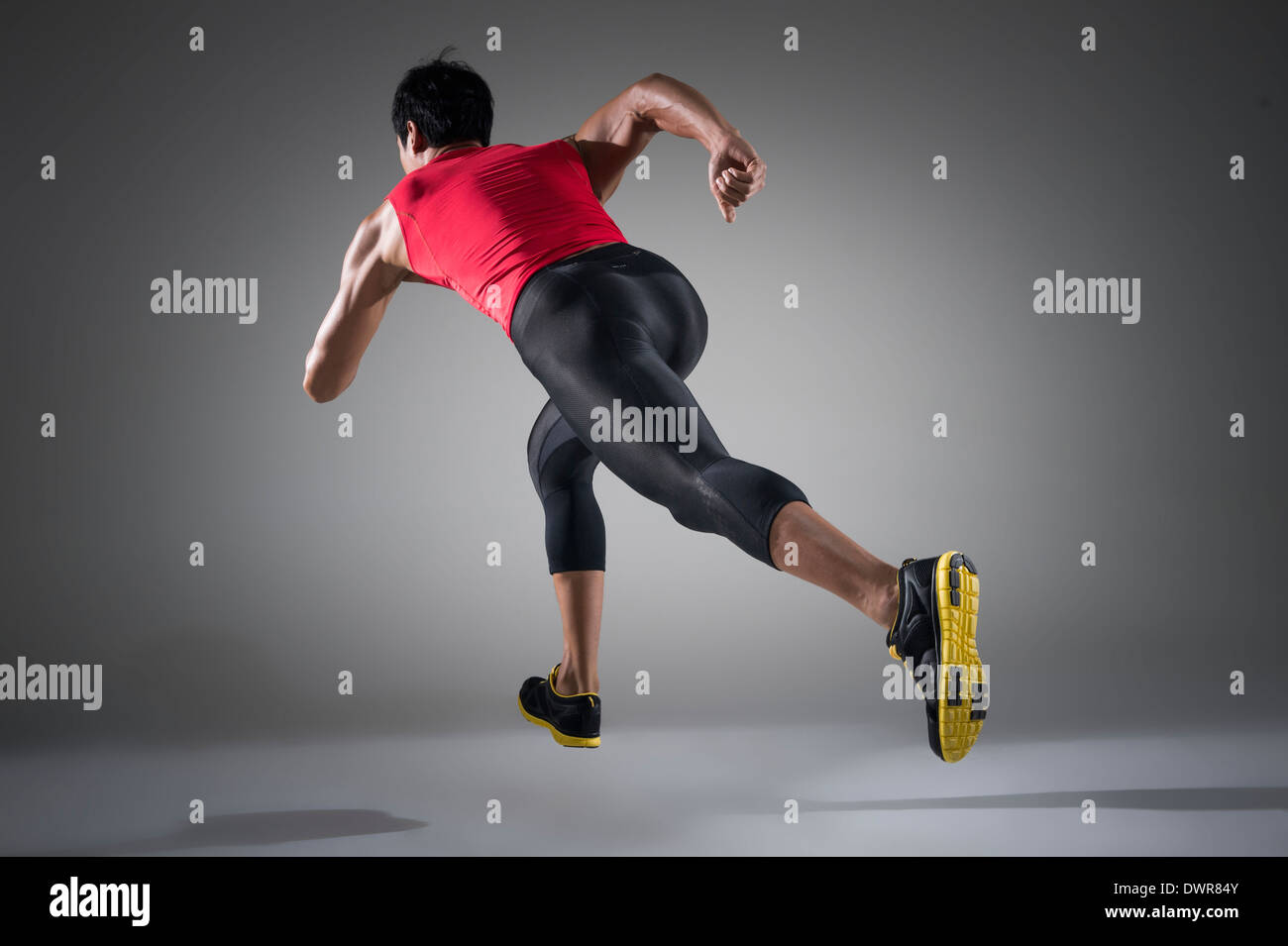 side shot of a runner running Stock Photo - Alamy