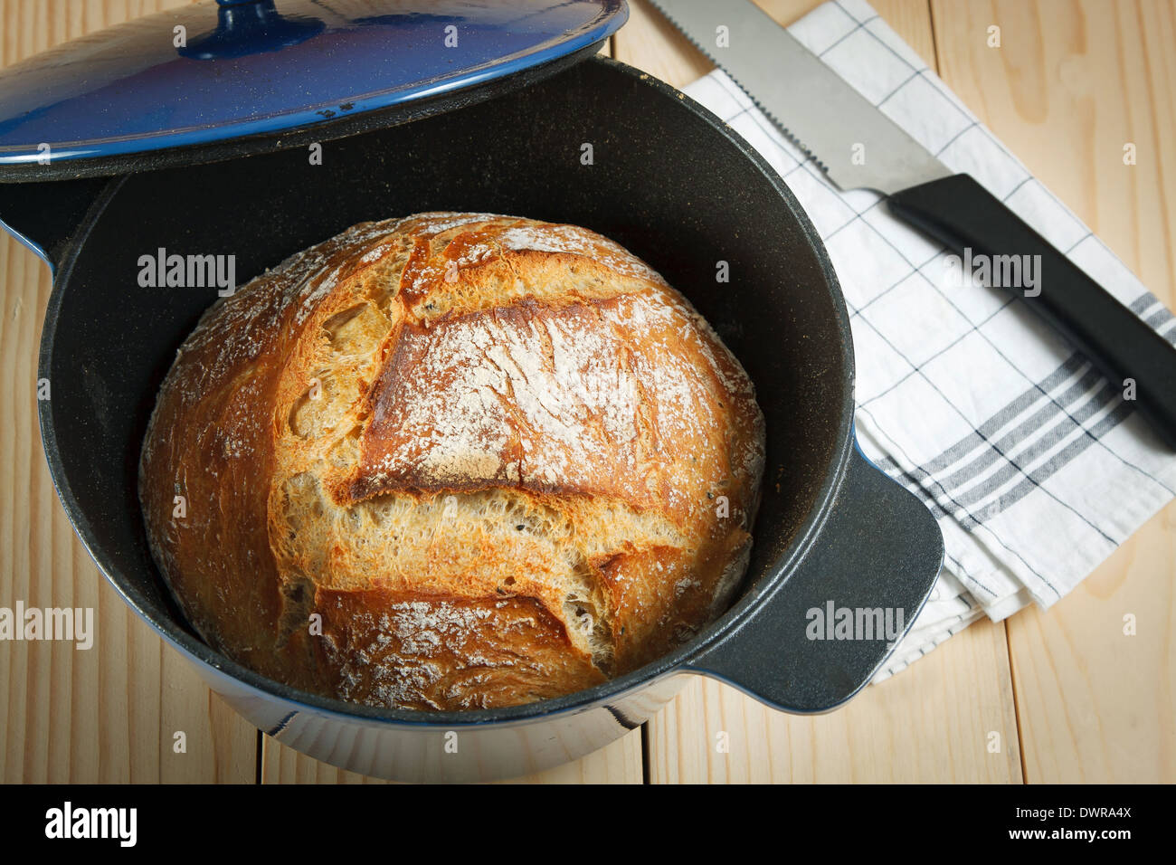 Home made bread baked in iron pot Stock Photo - Alamy