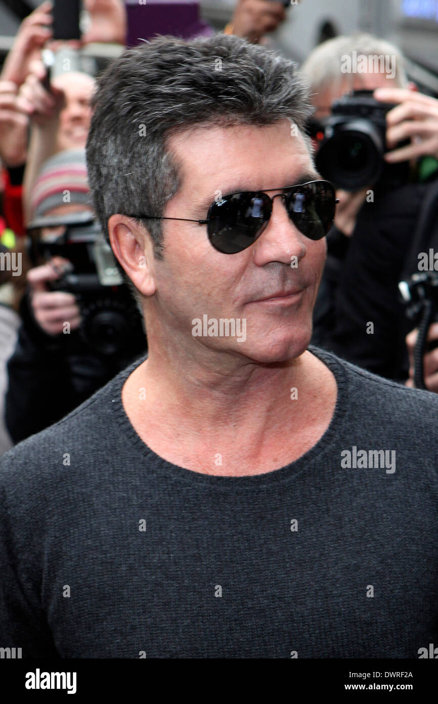 London, UK. 11th Mar, 2014. Simon Cowell arrives at Dover St Arts Club ...