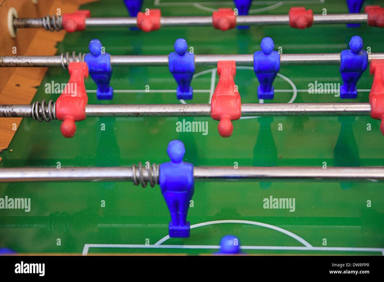 foosball table game in action, motion blur Stock Photo - Alamy