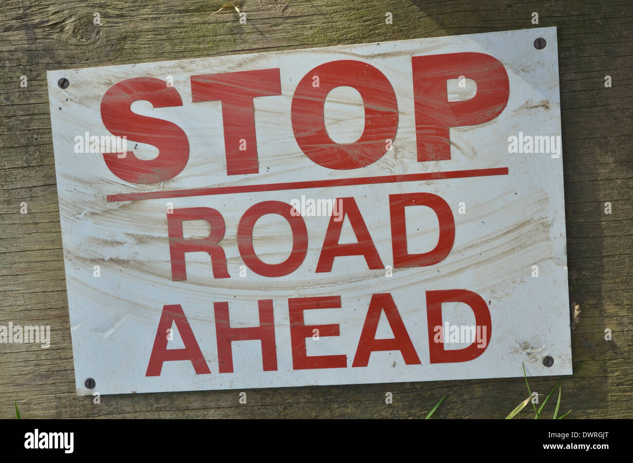 Warning stop sign Stock Photo - Alamy