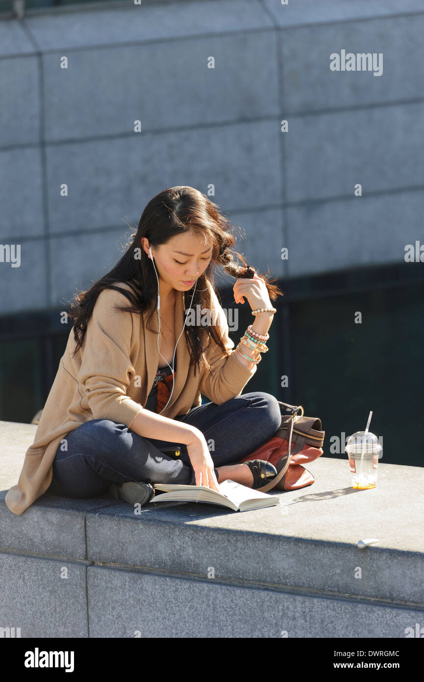 Legs folded hi-res stock photography and images - Alamy