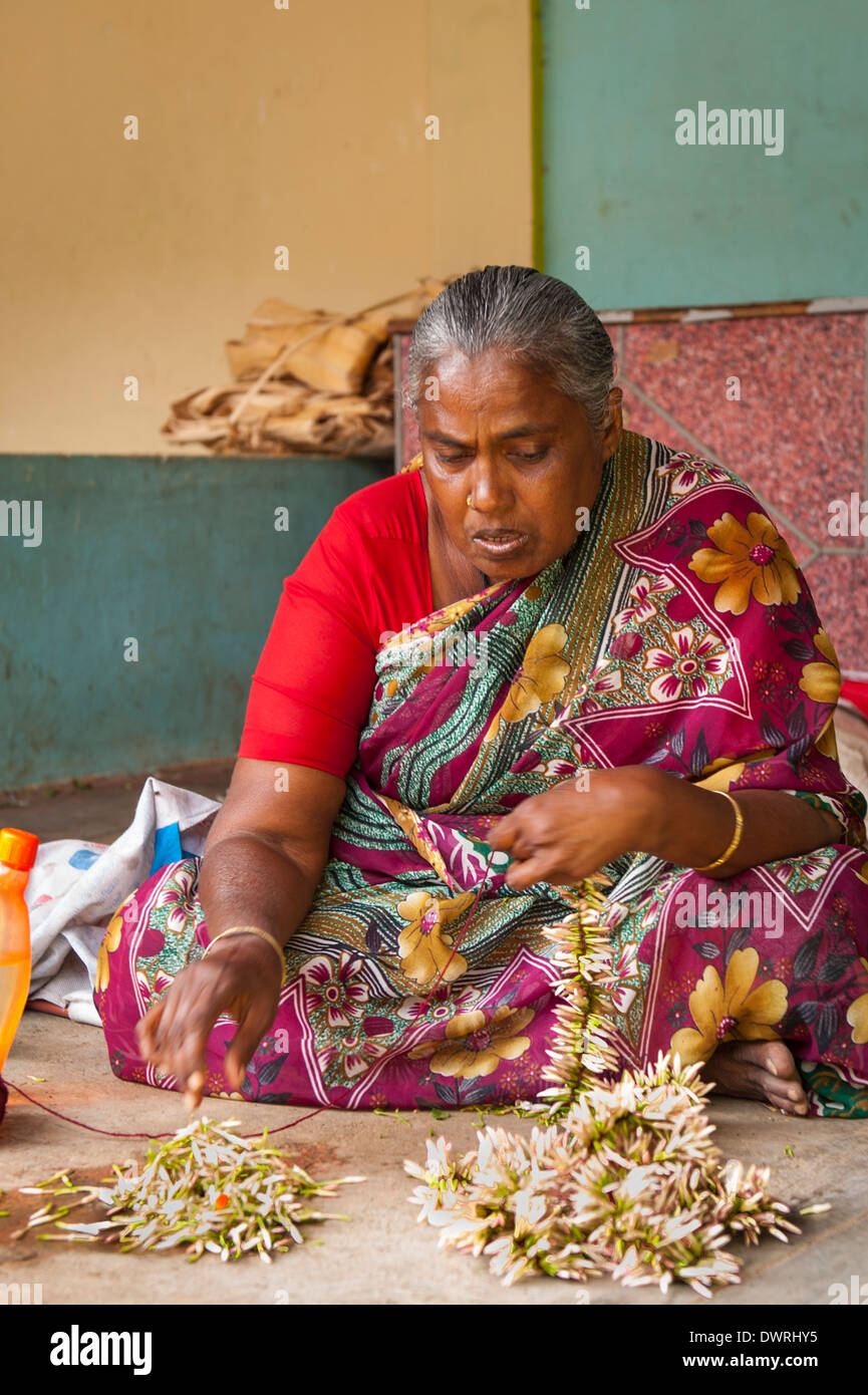 South Southern India Tamil Nadu Madurai flower market old lady female ...