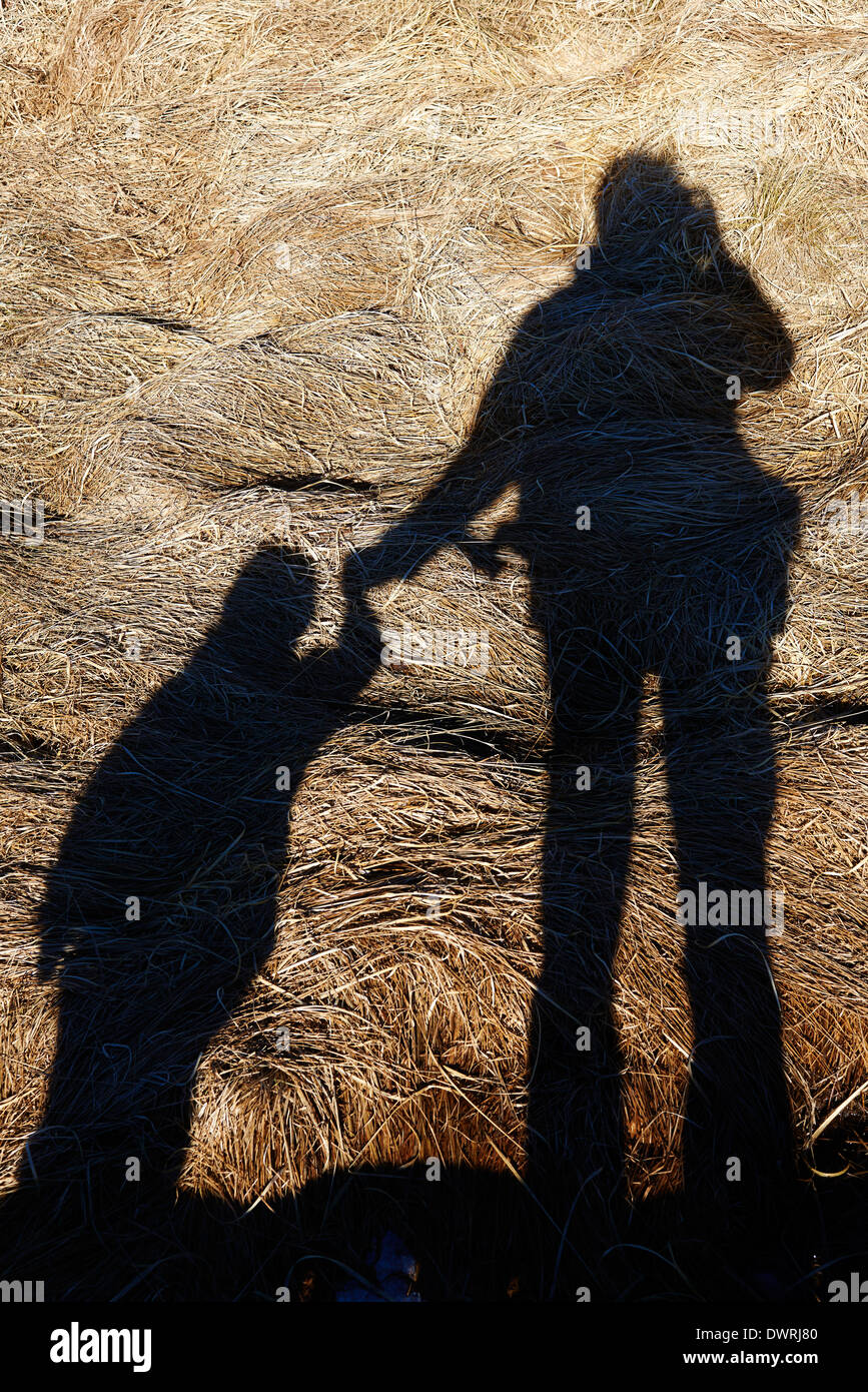 Selfie shadow portrait of photographer - father with his daughter over ...