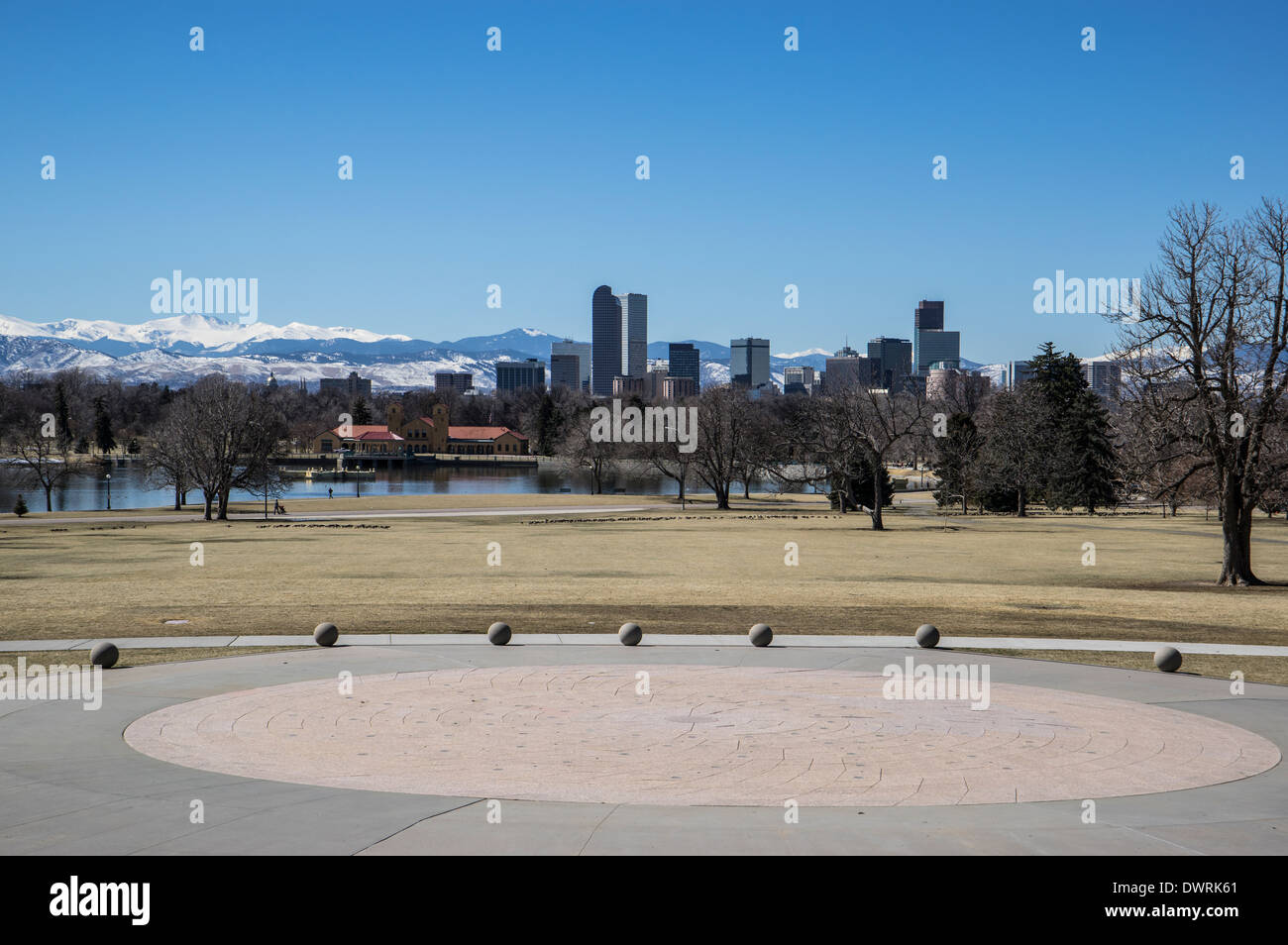 Denver skyline with snow covered mountains in background Stock Photo ...